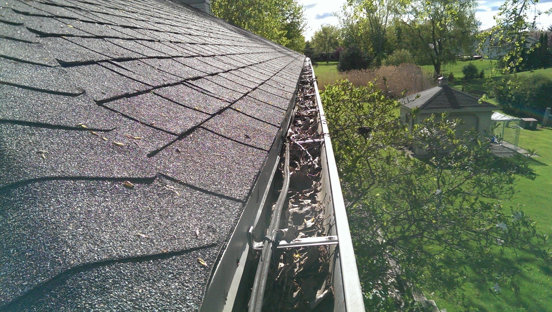 Clay Leaf-X Gutter Covers on Existing Gutters